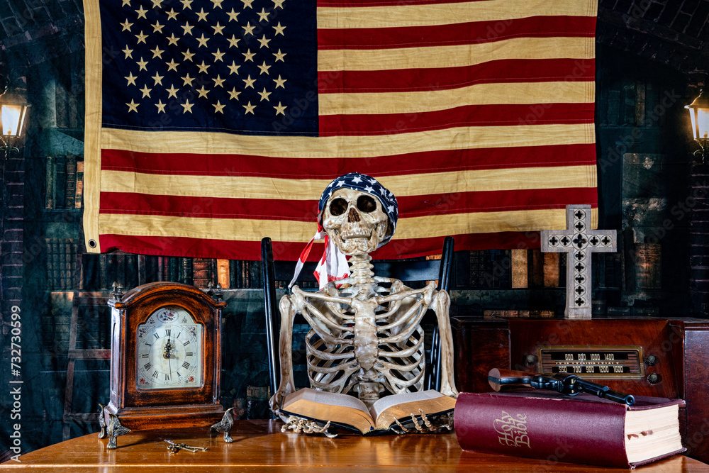 Skeleton in library reading bible with gun and American flag background ...