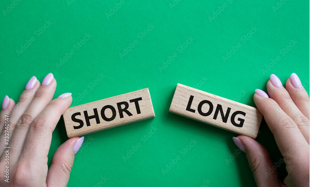 Short vs Long symbol. Concept word Short vs Long on wooden blocks ...