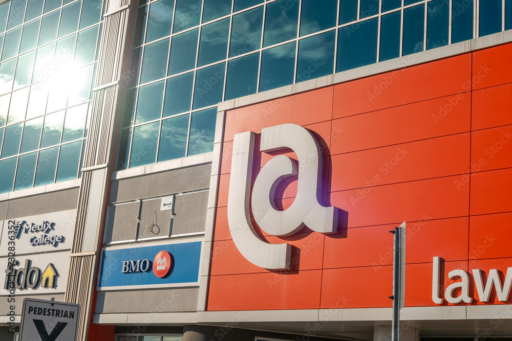 exterior building facade and sign of Lawrence Allen Centre, a shopping ...