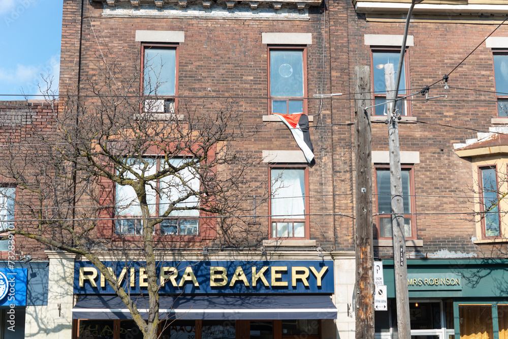 exterior building facade and sign of Riviera Bakery located at 576 ...