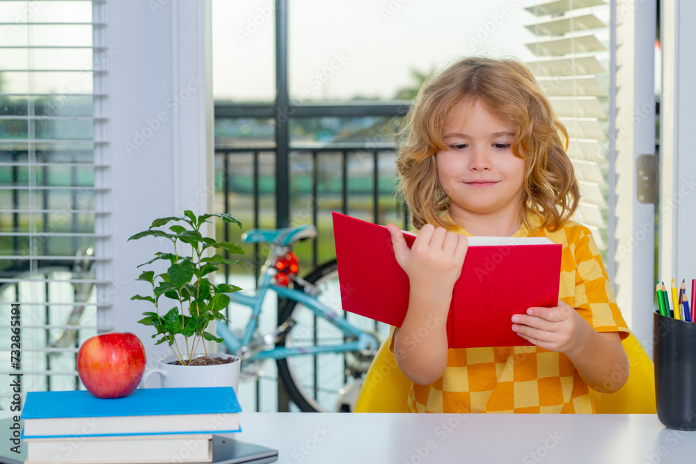School kid reading book. School child student learning at home, study ...