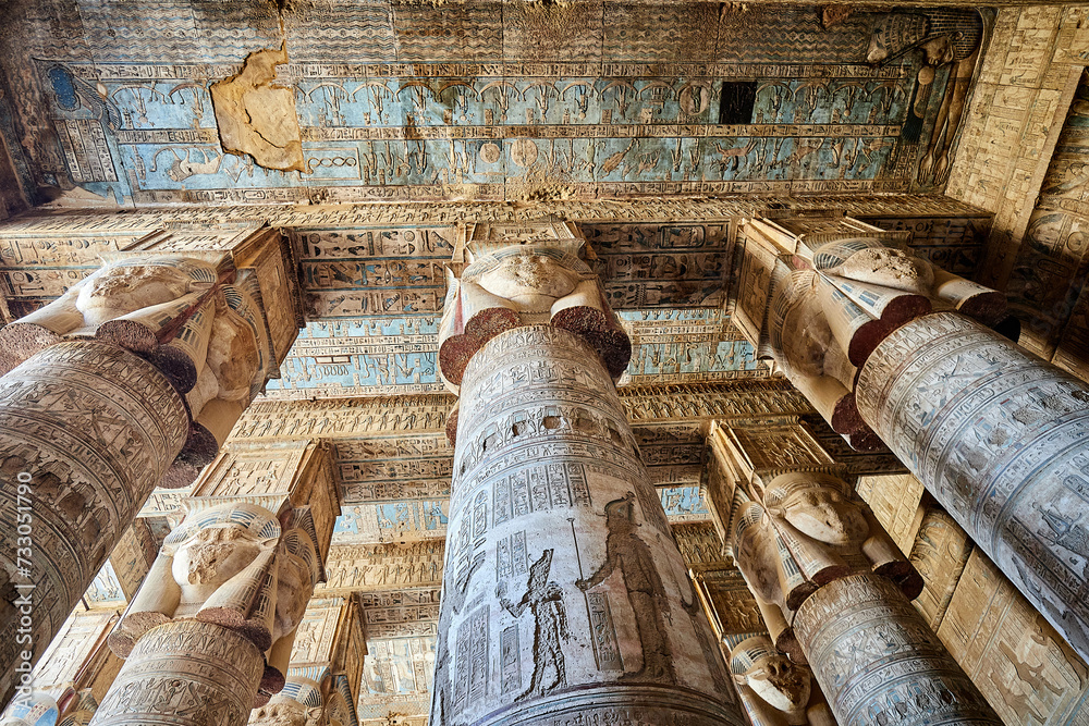 Colourful columns with the head of goddess Hathor and blue astronomical ...