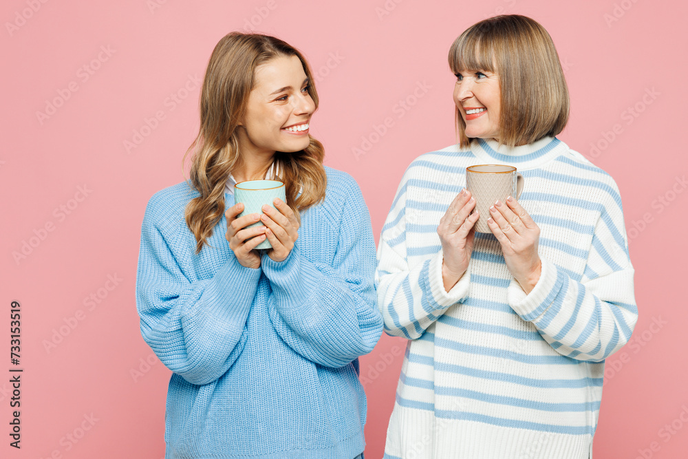 Elder parent mom 50s years old with young adult daughter two women ...