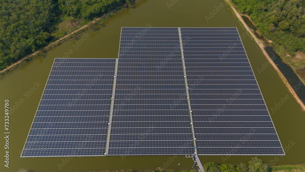 Power panels for green energy. Floating solar panels or solar cell Platform system on the lake ...