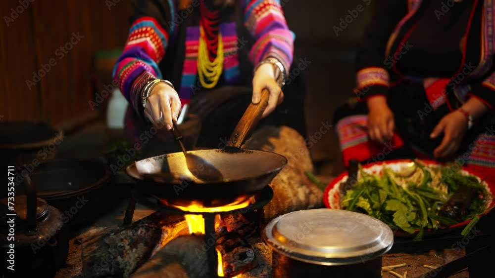 Asian family cooking and having dinner together at home. Hill tribe man ...