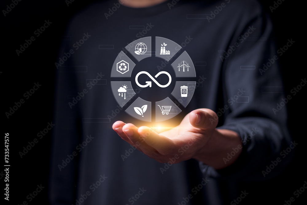 Circular economy concept. Person holding circular economy icon on ...