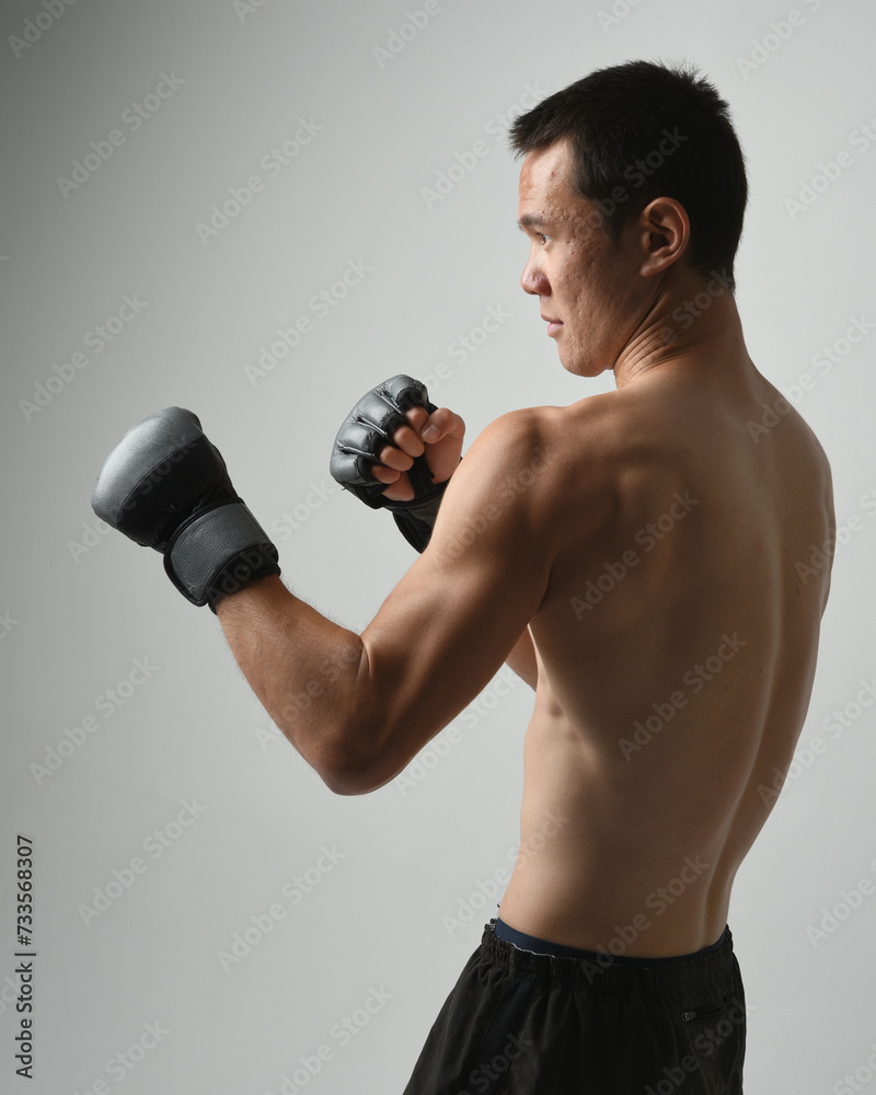Close up portrait of fit asian male model, shirtless with muscles ...
