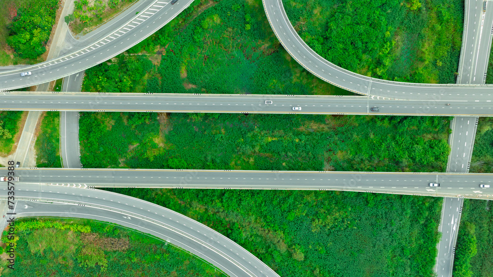 Cars on forest roads and elevated traffic intersections, modern road ...