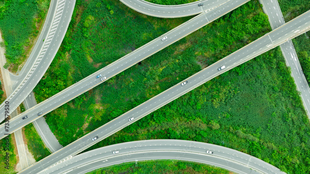 Cars on forest roads and elevated traffic intersections, modern road ...