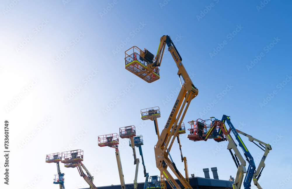 Access equipment and boom lifts with an elevating platform for raising ...