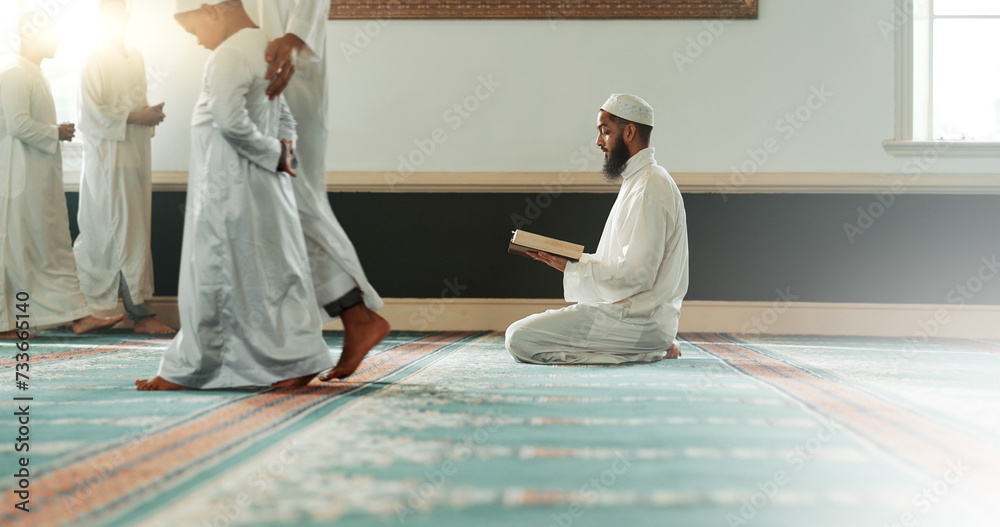 Quran, islamic and man reading for faith in a mosque for praying, peace ...