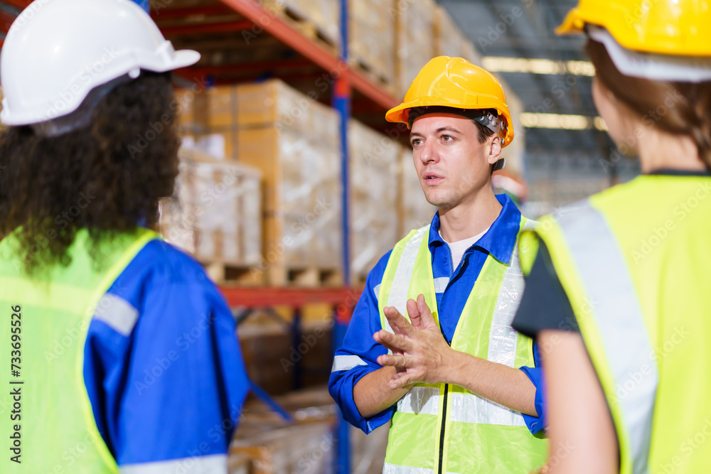 team of warehouse personnel is conducting a comprehensive stock ...