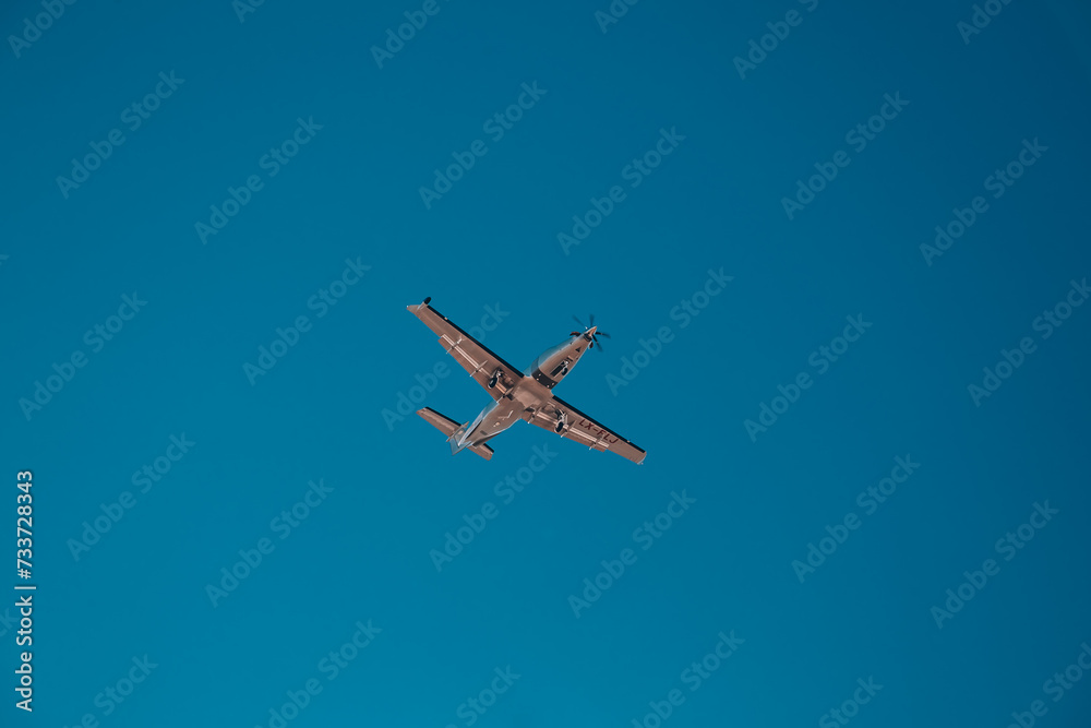Italy, Lombardy, Milan 14.12.2023. Propeller plane at the blue sky ...