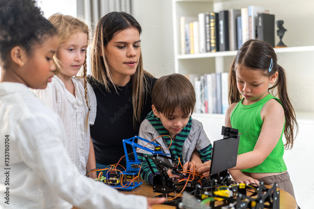 Portrait happy teacher help school children student having fun activity ...