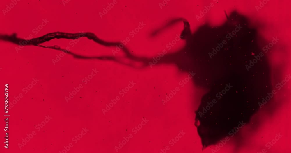 Red horror bacteria and large dark veins under a microscope. Thriller ...