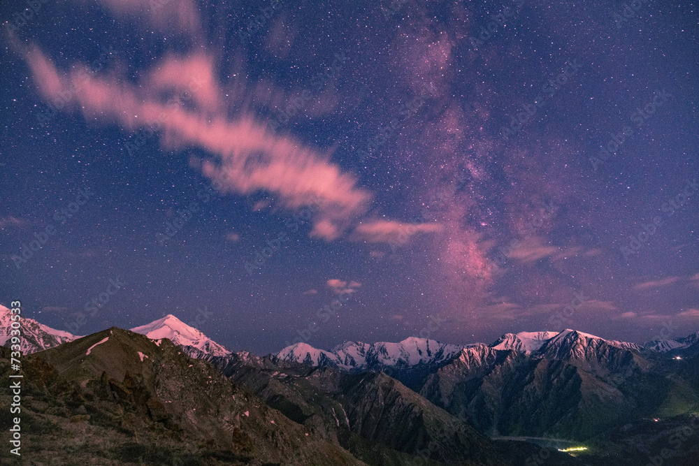 Magical atmosphere of the transition from night to sunrise; snow-capped ...