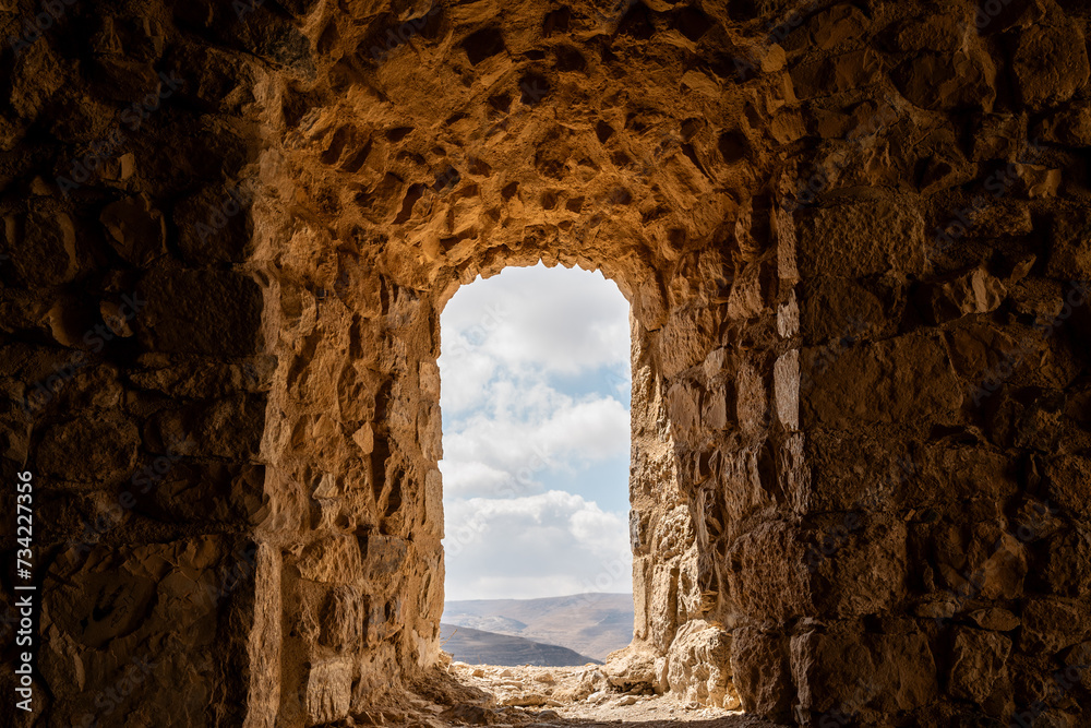 close up detail of crusader castle with dry desert heat. Rocks and ...