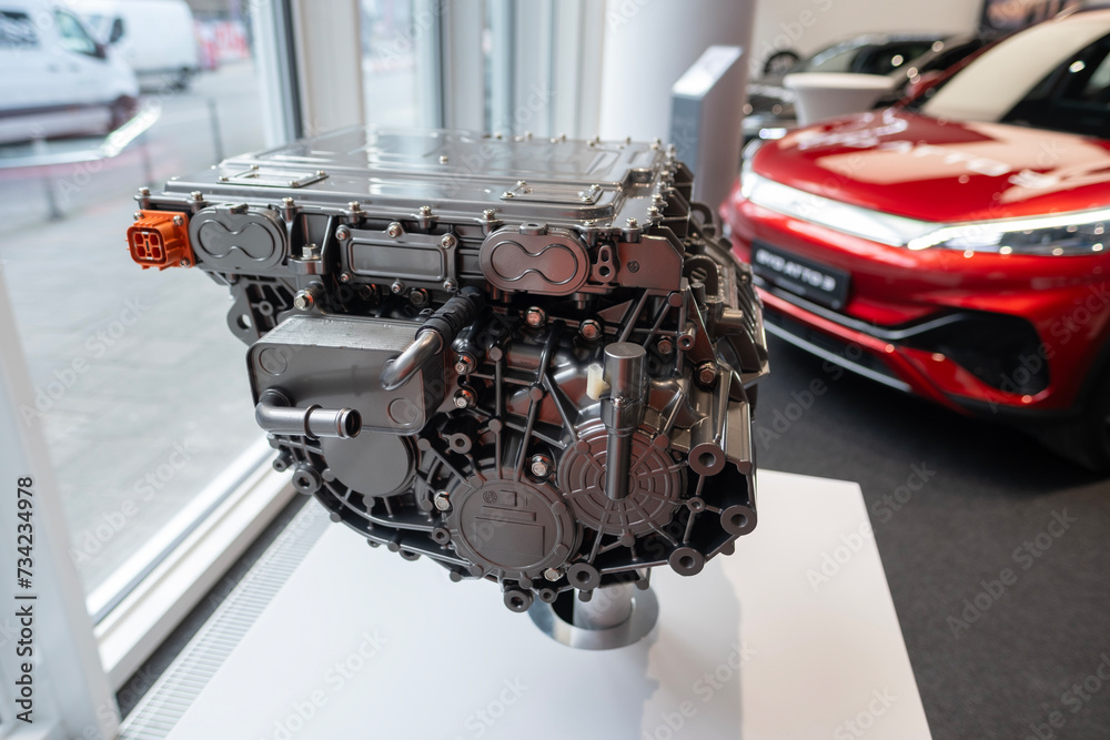 innovative electric motor BYD Electric against background of red BYD ...