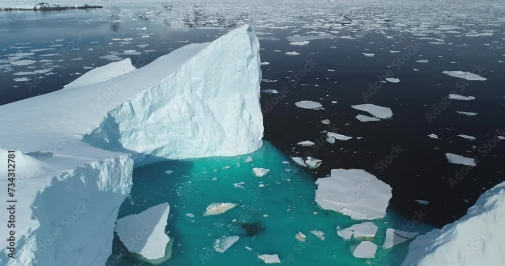 Huge snow glacier melting in South Pole ocean. Crashed ice floating ...
