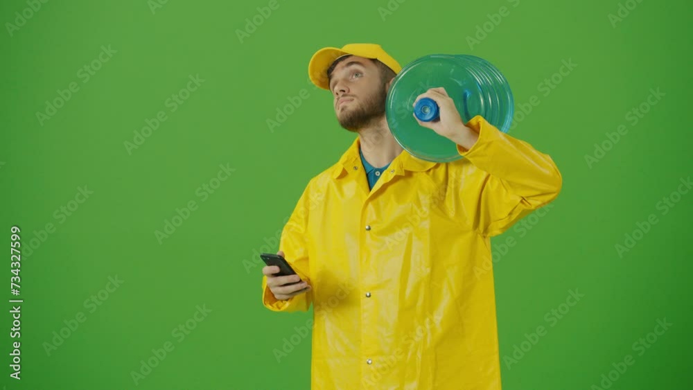 Green Screen Portrait of a Delivery Person in Uniform Holds a Big ...