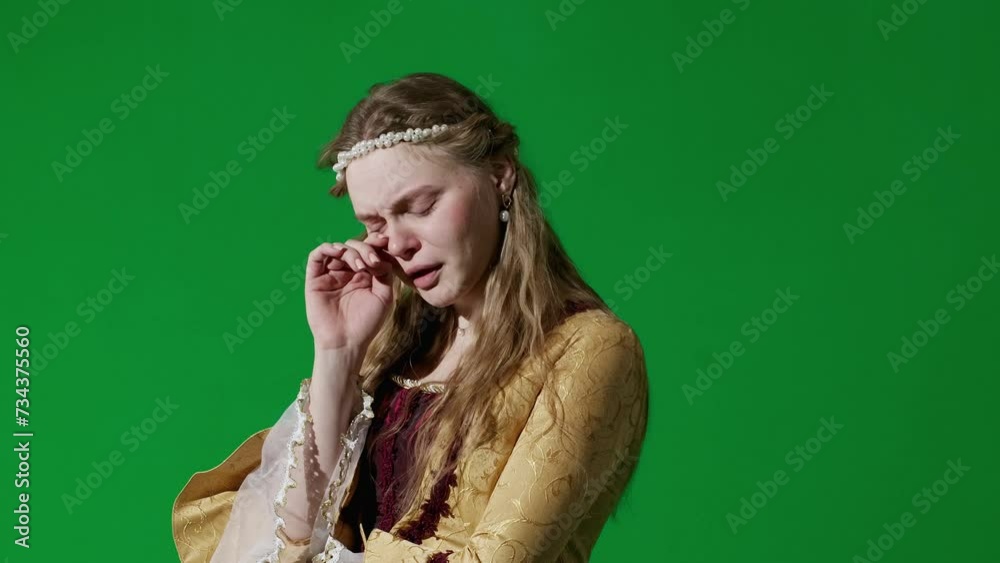 Woman in ancient outfit on the chroma key green screen background ...