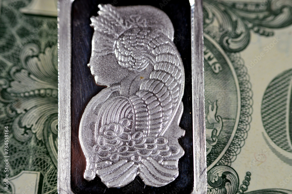 USD American dollars cash money and silver precious metal ounce bar of ...