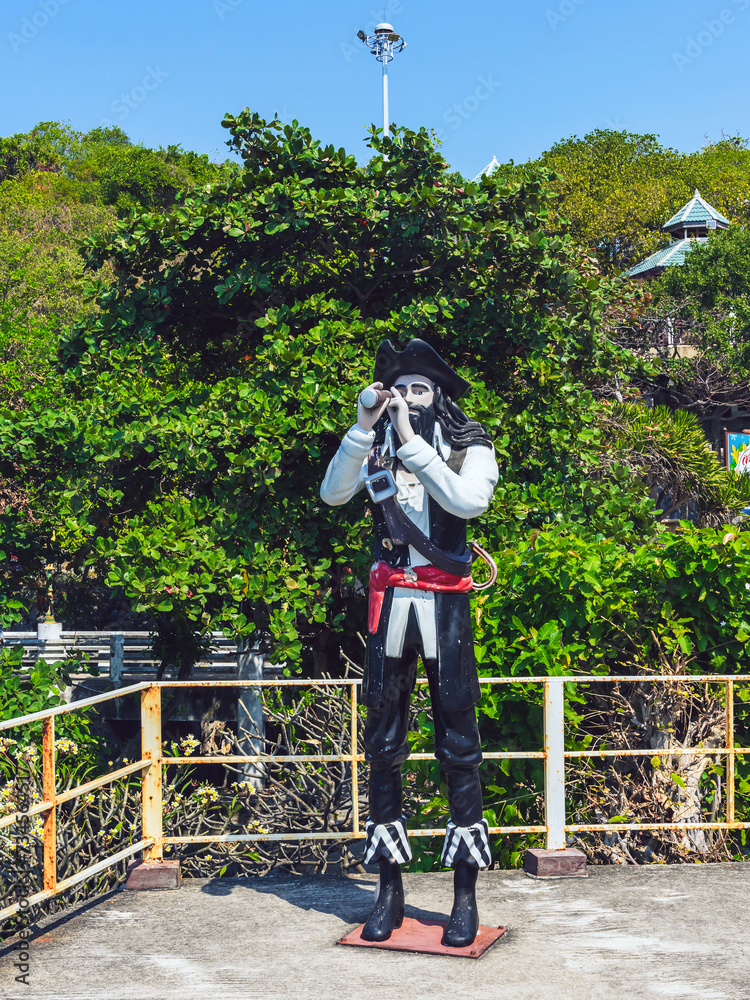 CHONBURI-THAILAND,JANUARY 21, 2024 : A pirate statue using binoculars ...