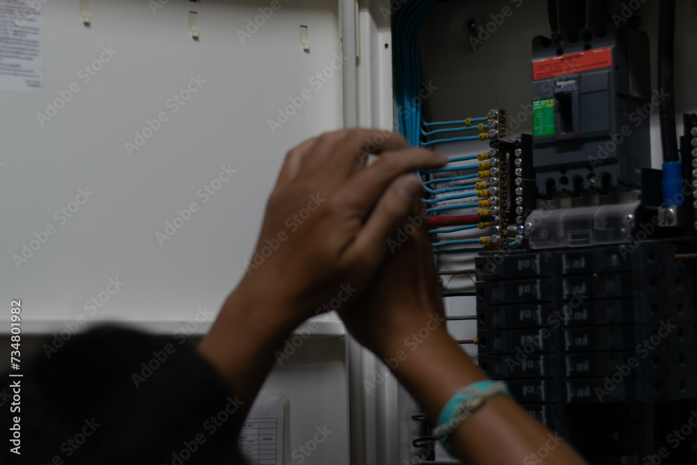 Electrician work tester measuring voltage and current of power electric ...
