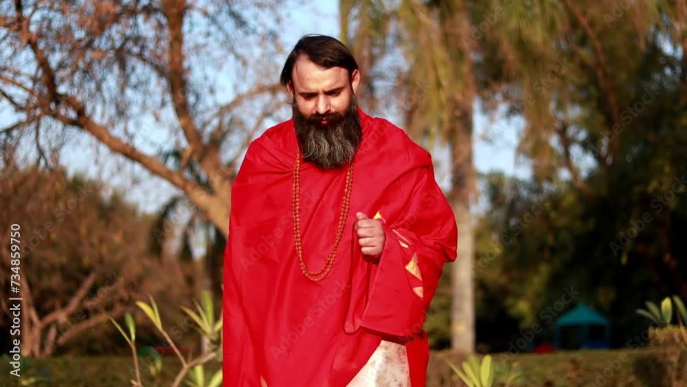 Beard, religious saint of Indian ethnicity wrapping traditional red ...