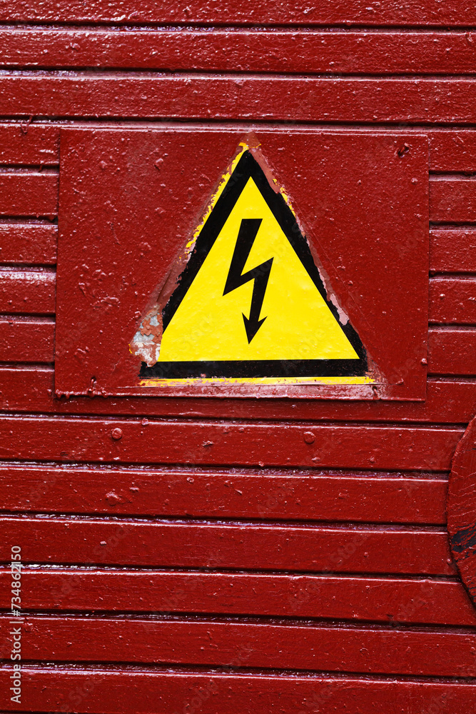 Caution dangerous alert sign. Old door, painted burgundy with thick ... Caution dangerous alert sign. Old door, painted burgundy with thick ...