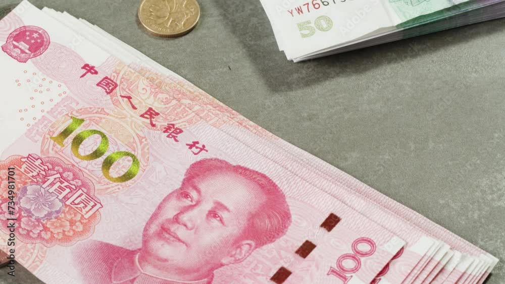 Detailed close up of 100 Yuan, the Chinese currency,CNY. A big wad of ...