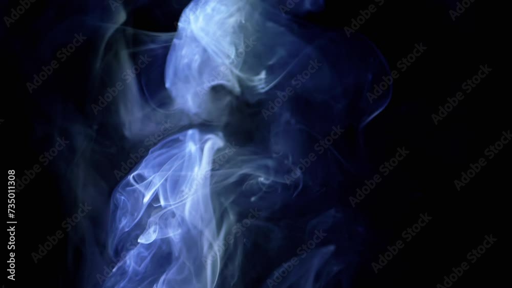 Vidéo Stock Thick Curls of Icy Blue Smoke Rise Up in Rays of Neon Light ...