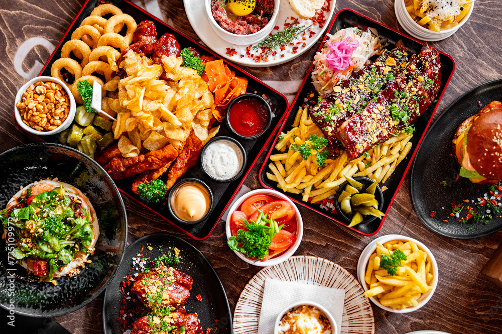 variety of restaurant food dishes on table. top view. Stock Photo ...