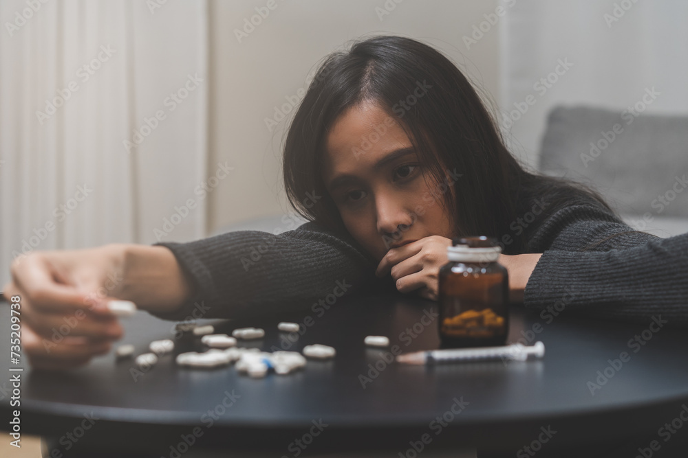 Anti drugs, drug addict asian young woman hand holding pills ...