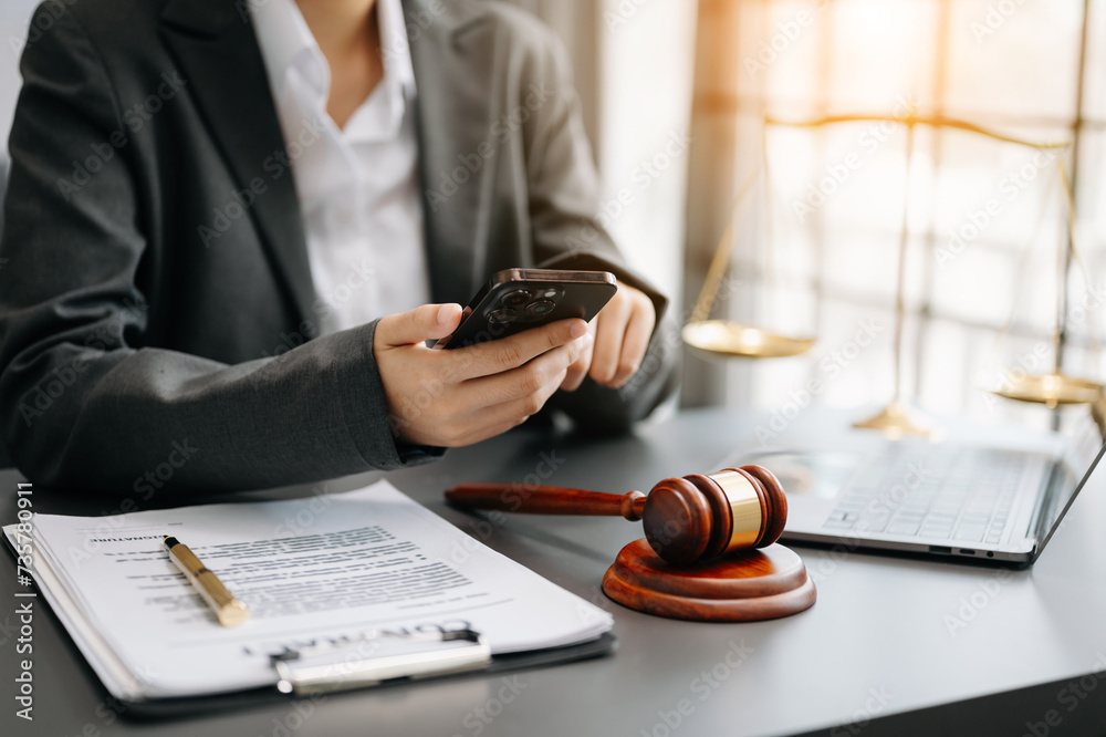 justice and law concept. Female judge in a courtroom the gavel, working ...