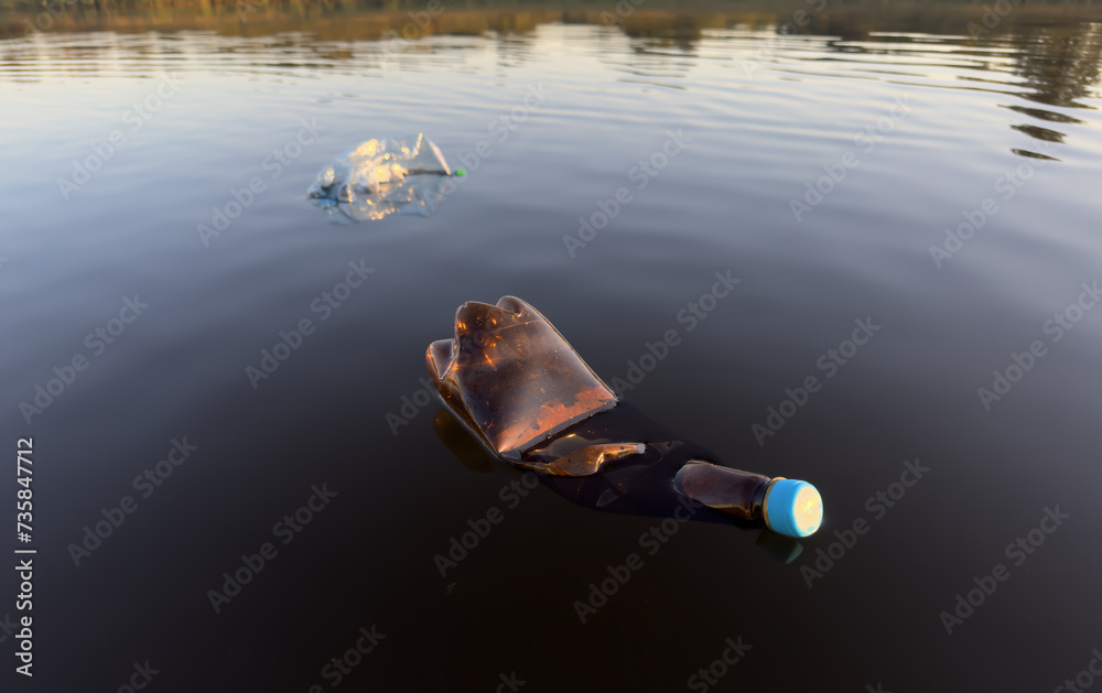 Marine plastic pollution. Plastic waste in lake. Microplastics ...