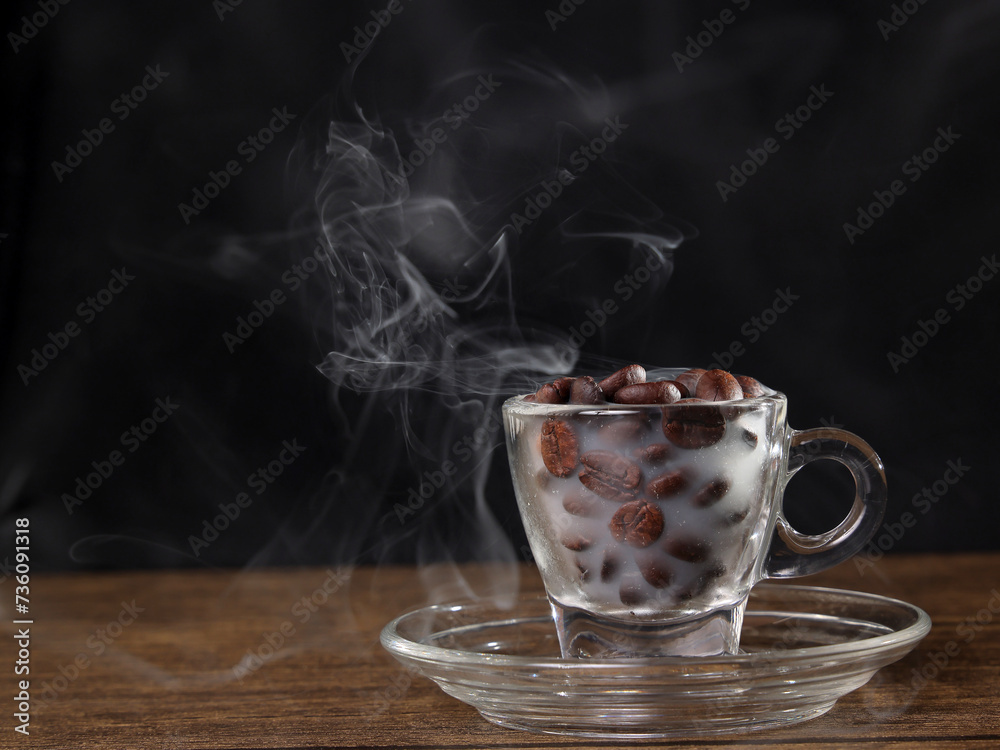 Smoke vape fog flowing out of transparent glass coffee cup filled with ...
