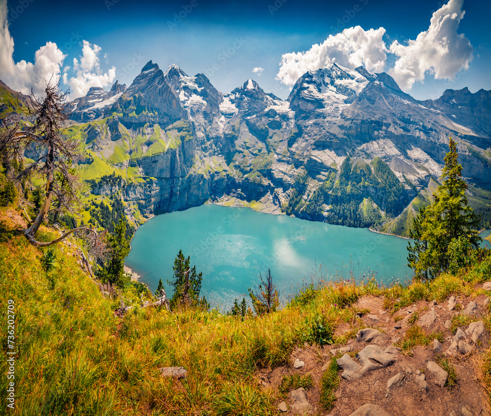Spectacular summer morning on the unique Oeschinensee Lake. Astonishing ...