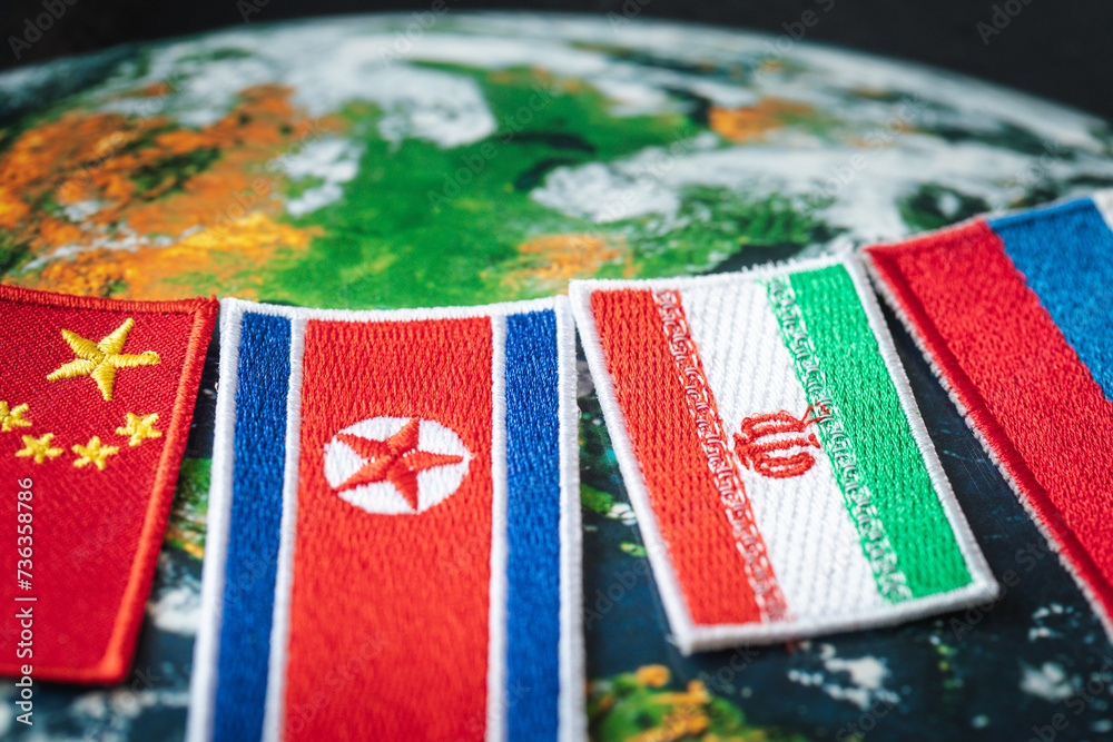 Symbols of Russia, China, North Korea and Iran against the background ...