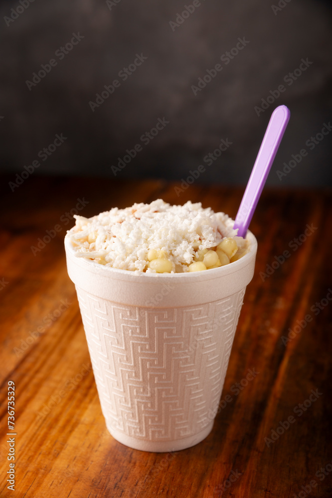 Esquites. Corn kernels cooked and served with mayo, sour cream, lemon ...