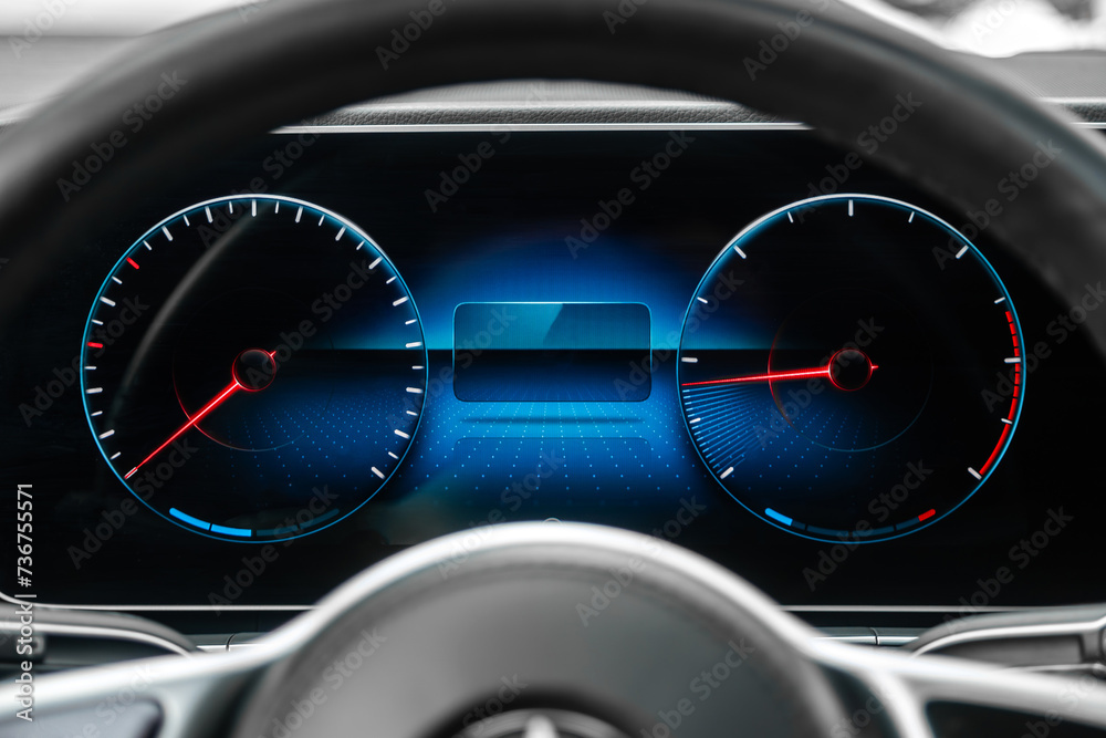 Close-up shot of a car's digital speedometer.Modern light car mileage ...