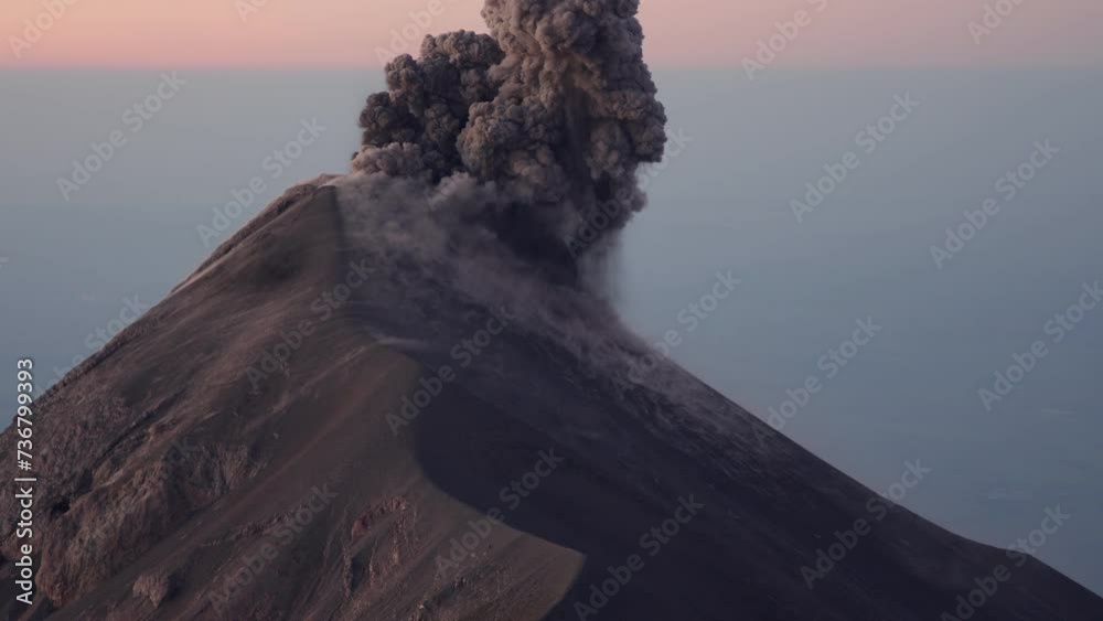 Massive Fuego Volcano eruption at sunrise, ash plume creates ...