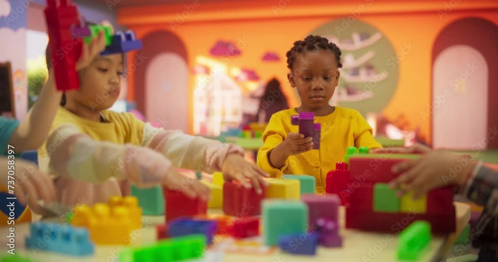 Cheerful Diverse Kids Playing with Colorful Building Block Toys in Kindergarten. Beautiful Black ...