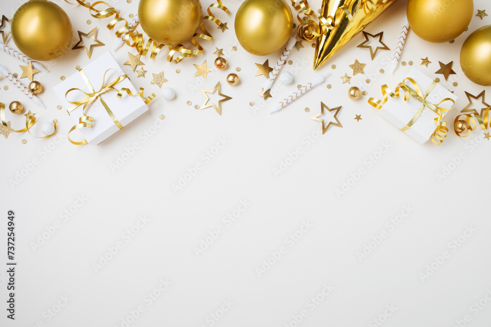 Golden birthday party background with festive decoration from gift box ...