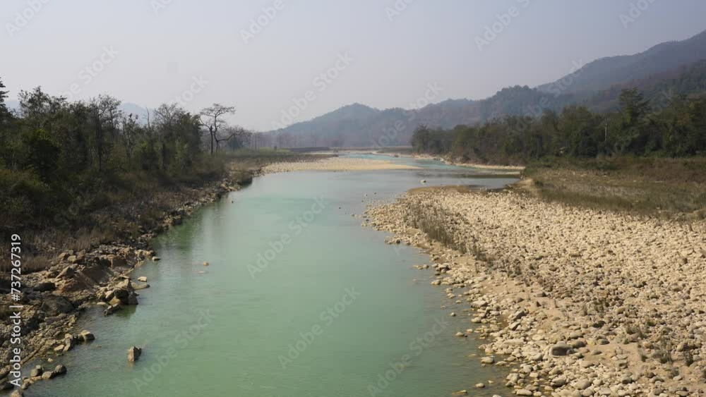 Mesmerizing beauty of Nepal as a river gracefully flows through ...