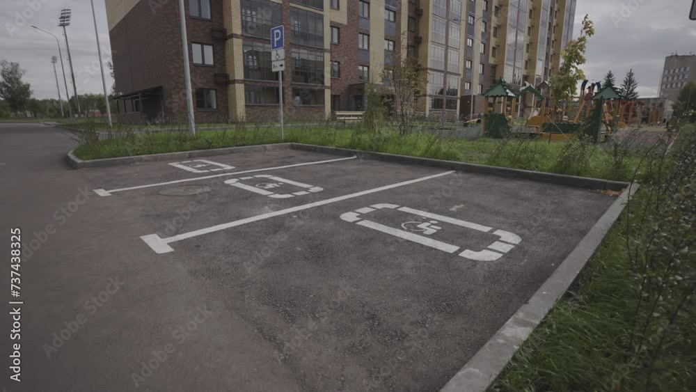 Parking lot spaces for inclusive people near building to provide ...