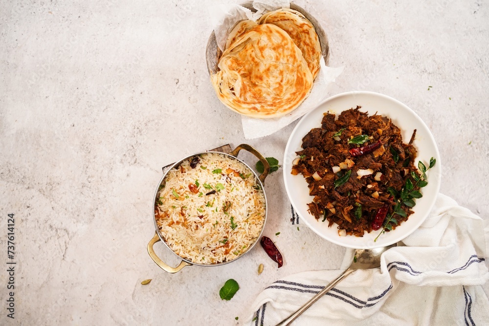 Kerala beef fry roast served with parotta and ghee rice - Malabar Iftar ...