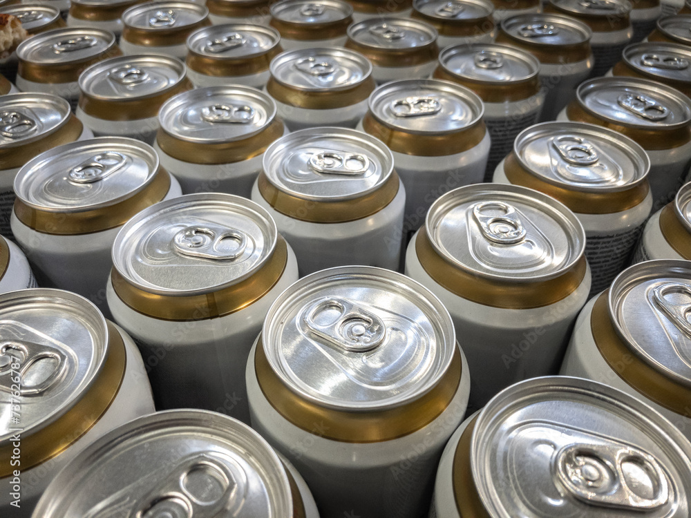 Selective bur on aluminum cans, beer cans, stacked and packaged in a ...