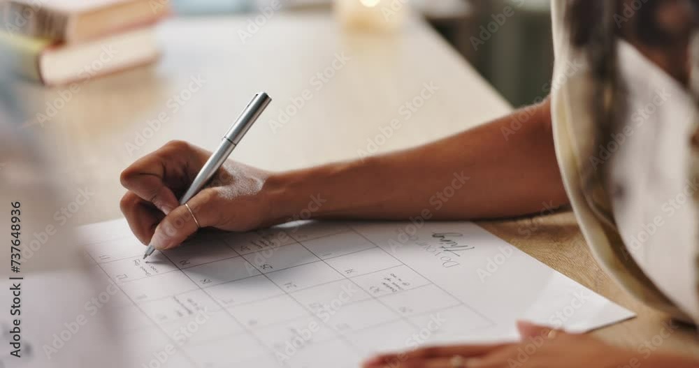 Hand, writing and calendar, plan schedule on desk and organization with ...