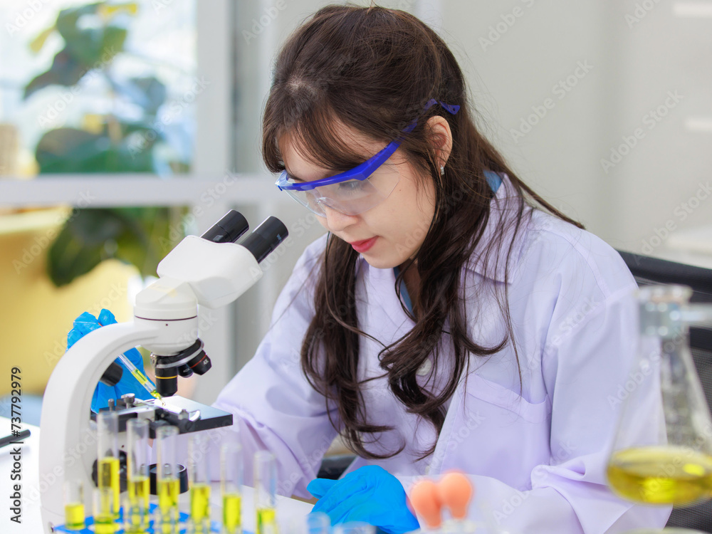 Asian young woman female laboratory professional scientist concentrated ...